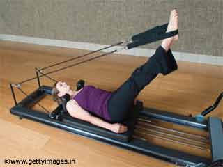 Leg Stretch - Pilates Reformer Exercises